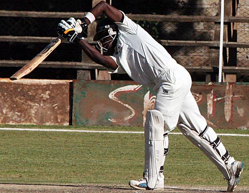 Maurice Ouma drives on his way to a century | ESPNcricinfo.com
