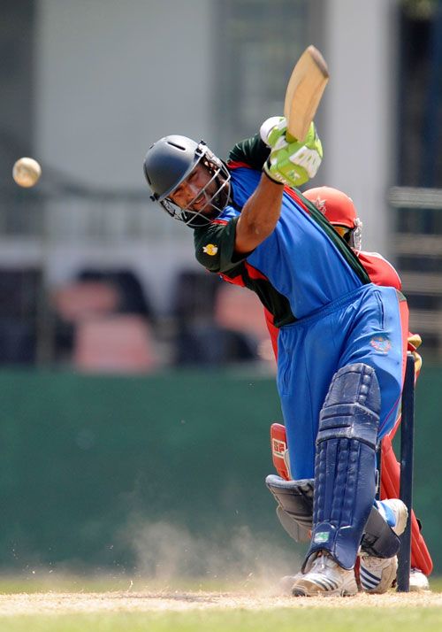 Karim Sadiq plays a big shot during his innings | ESPNcricinfo.com