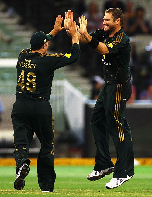 Ryan Harris gets the high-fives after sending back Denesh Ramdin ...