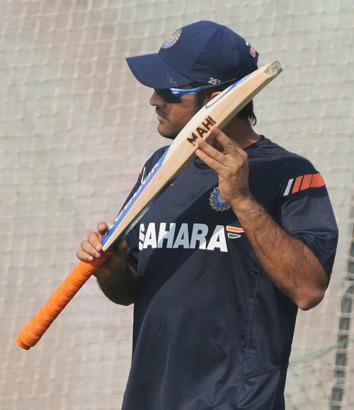 MS Dhoni tests his bat during practice | ESPNcricinfo.com