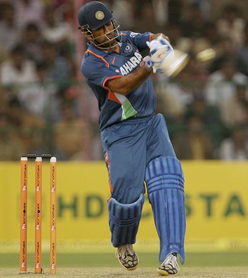 MS Dhoni whacks one into the leg side | ESPNcricinfo.com