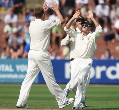 Doug Bollinger celebrates removing BJ Watling with Michael Hussey ...