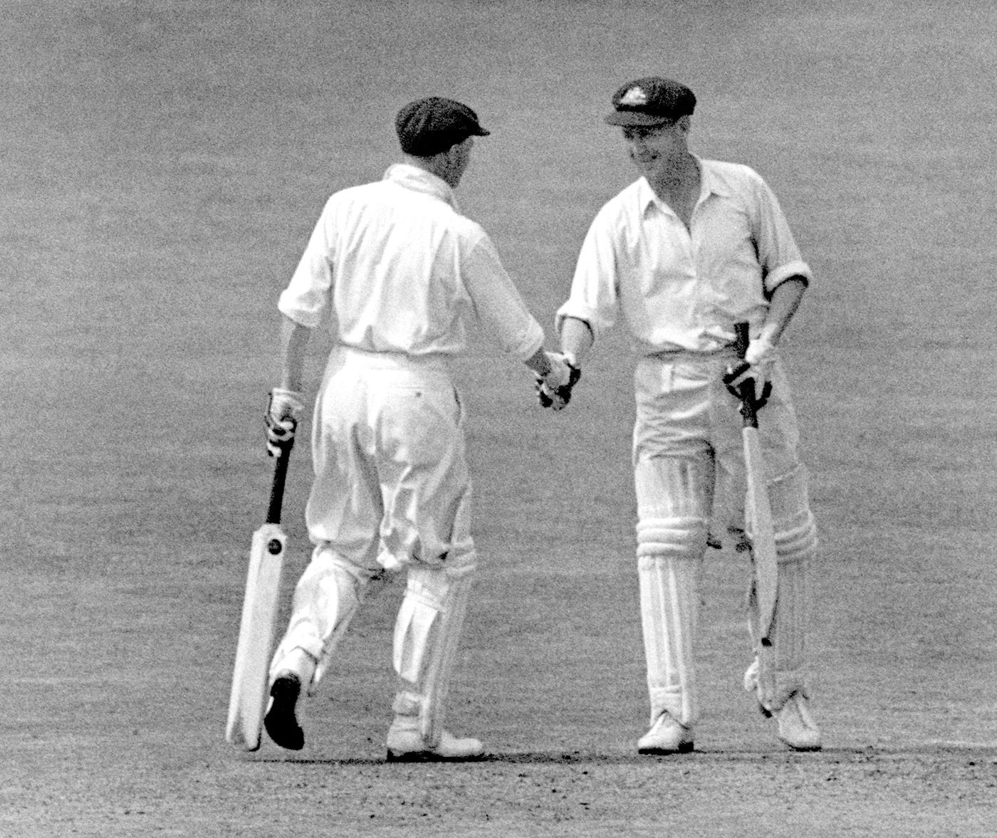 Don Bradman congratulates Arthur Morris on reaching his century ...
