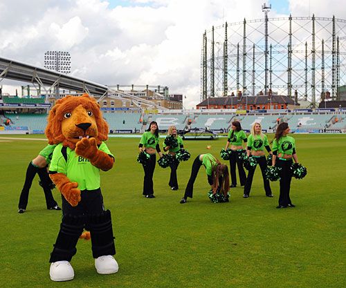 The Surrey mascot with the cheerleaders | ESPNcricinfo.com