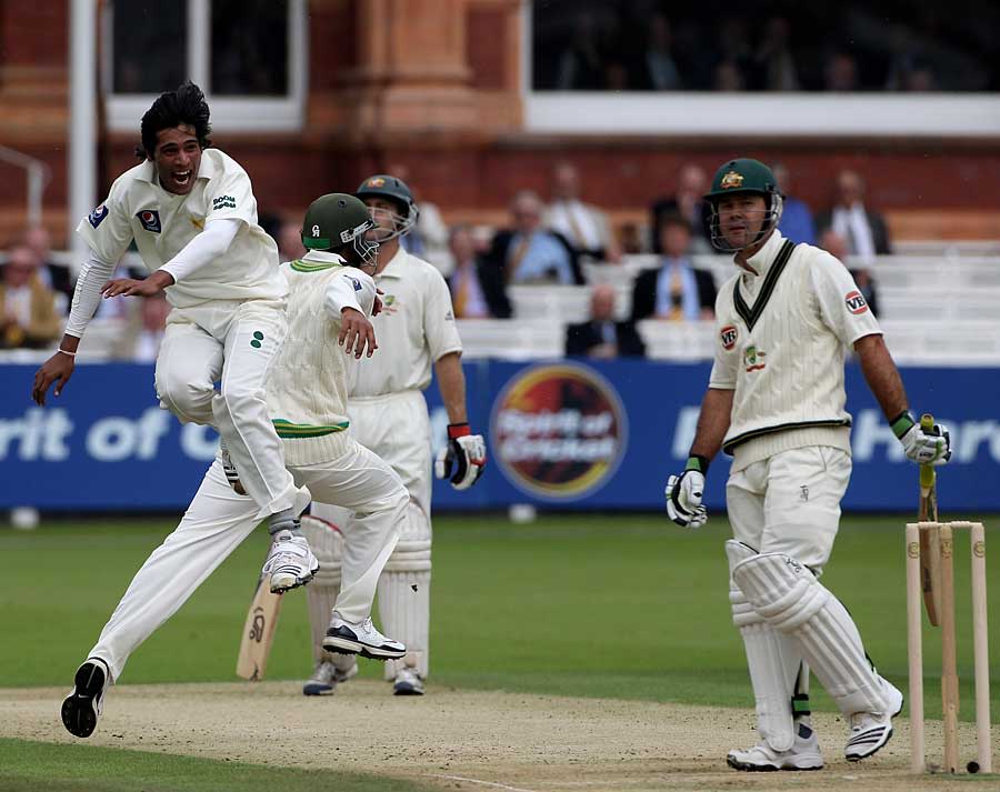 Mohammad Aamer celebrates after Ricky Ponting was caught at short leg ...