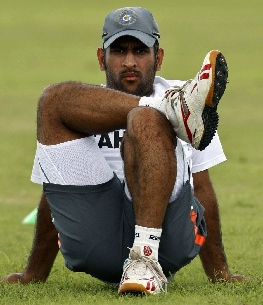 MS Dhoni stretches before the start of play | ESPNcricinfo.com