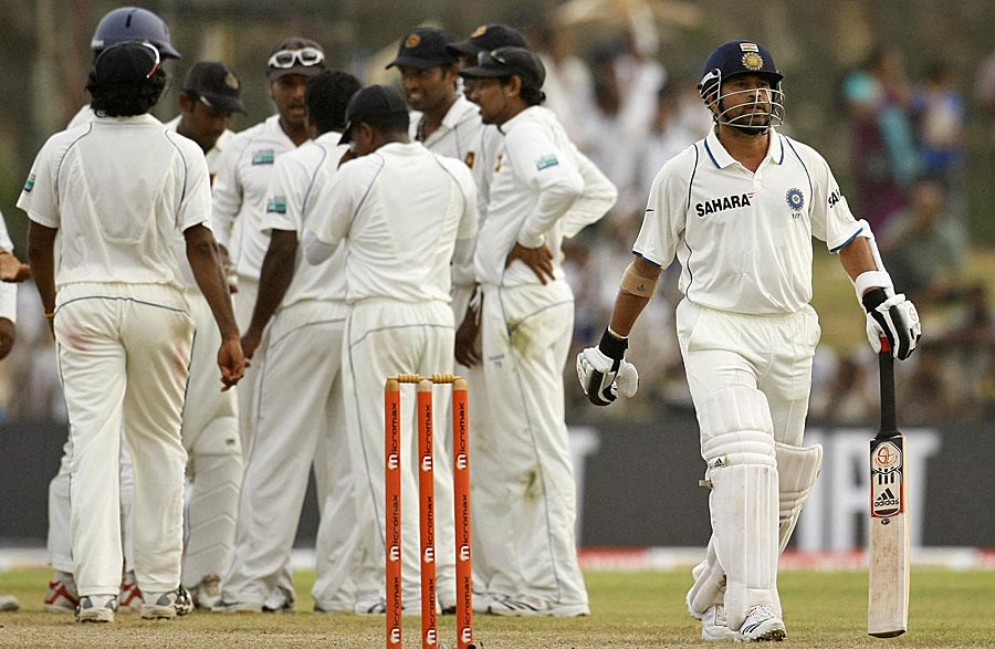 Sachin Tendulkar walks back after being trapped in front by Muttiah ...