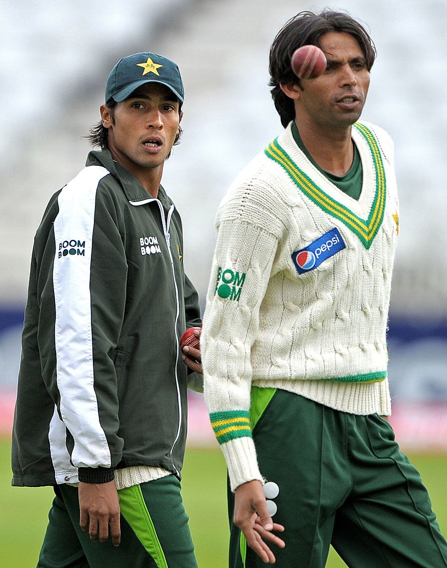 Mohammad Amir and Mohammad Asif head for the nets session ...