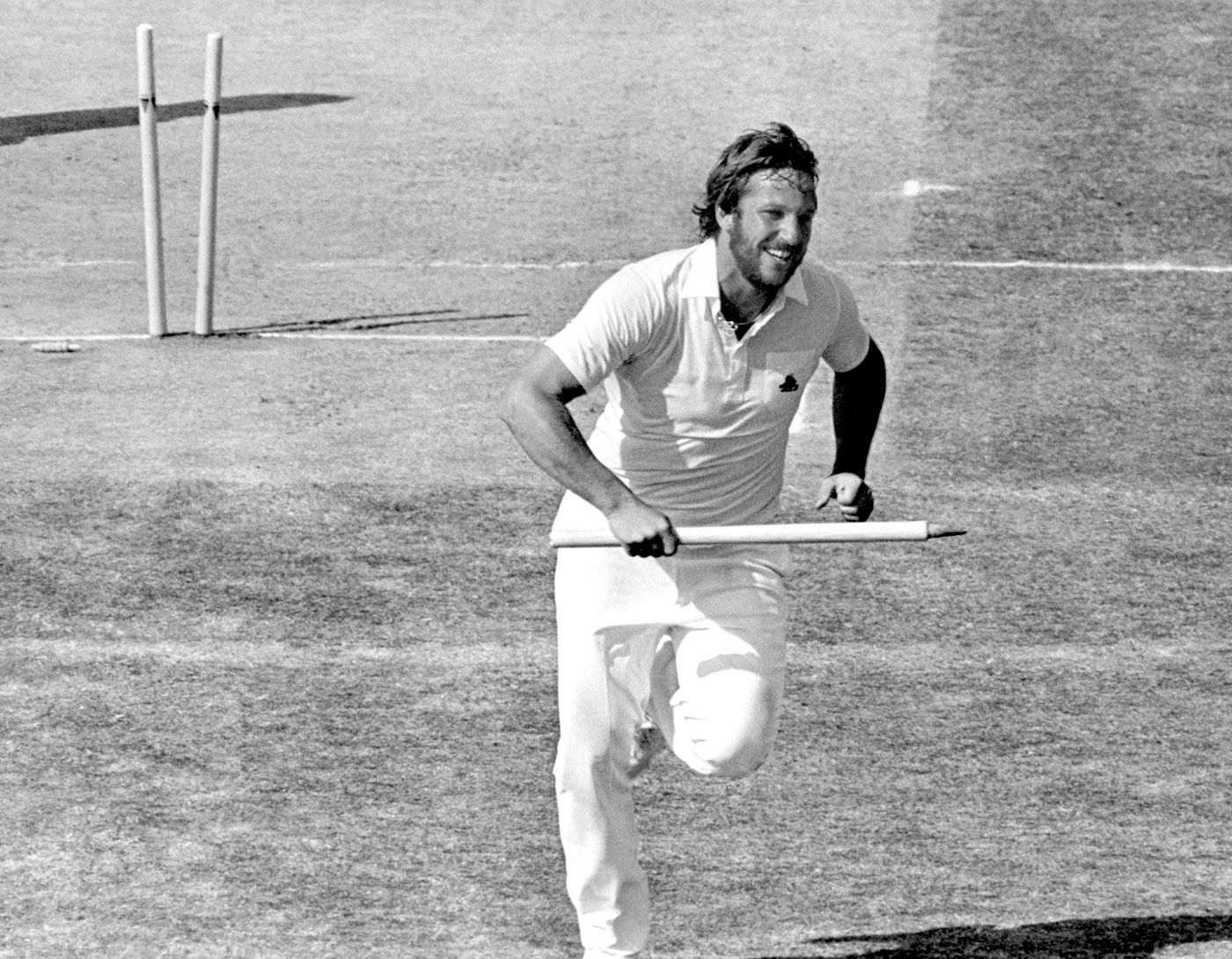 Ian Botham races back to the pavilion with a souvenir stump ...