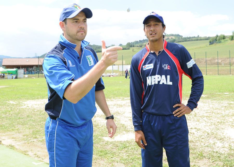 Italy captain Alessandro Bonora and Nepal captain Paras Khadka at the toss ahead of their ICC ...
