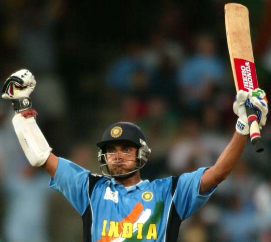 Ganguly raises his bat after reaching his hundred against Kenya at ...