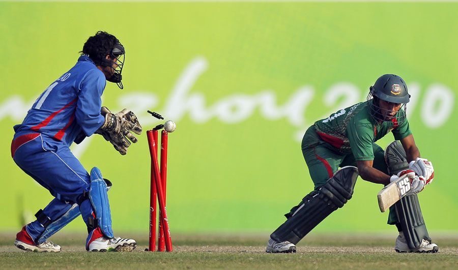 Mohammad Ashraful is bowled by Karim Sadiq | ESPNcricinfo.com