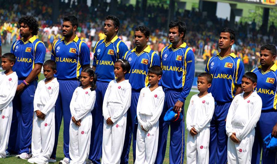 Sri Lanka players stand for their national anthem | ESPNcricinfo.com