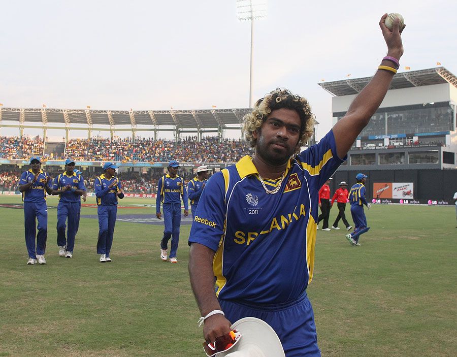 Lasith Malinga salutes the crowd after finishing with six wickets ...
