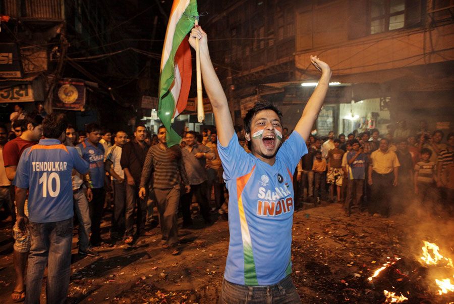 Fans in Delhi gather on the streets after India won the World Cup ...