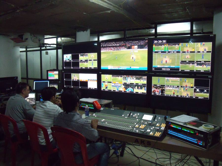 The vision mixer's desk and wall of monitors in the ESPN Star control ...