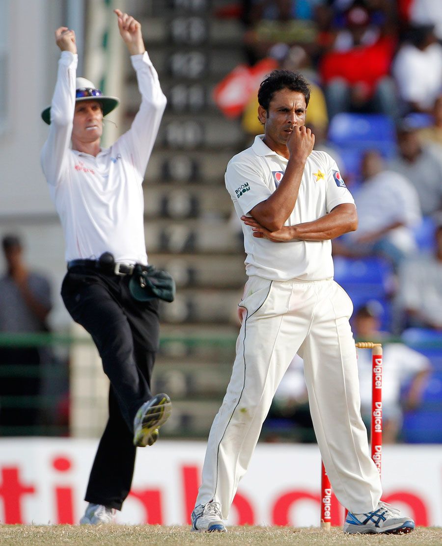 Billy Bowden signals a six off the bowling of Abdur Rehman ...