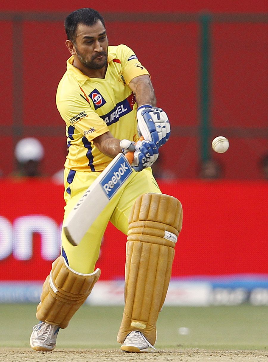 MS Dhoni prepares to smack the ball | ESPNcricinfo.com
