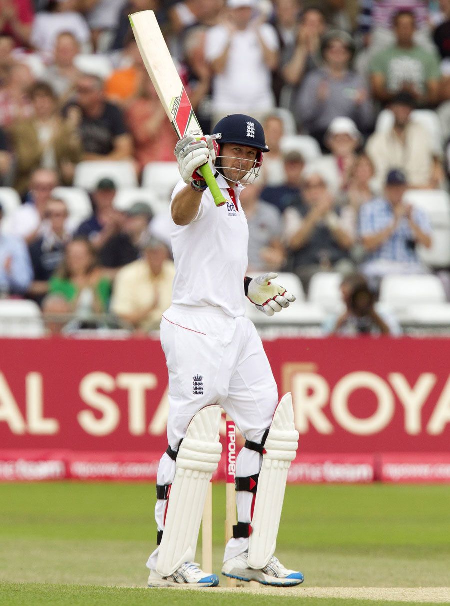 Tim Bresnan raises his bat after reaching his half-century ...