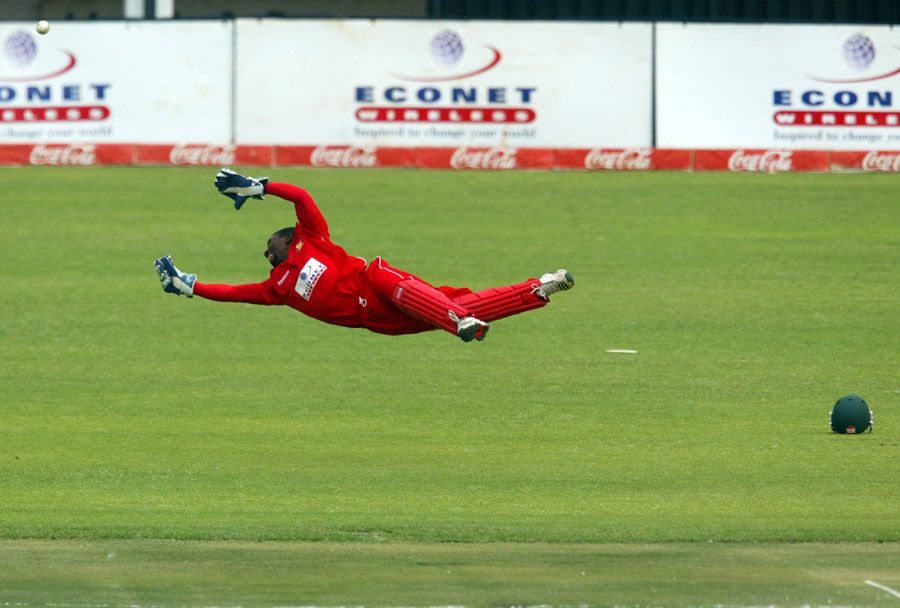 Tatenda Taibu makes an acrobatic dive but cannot stop the ball ...