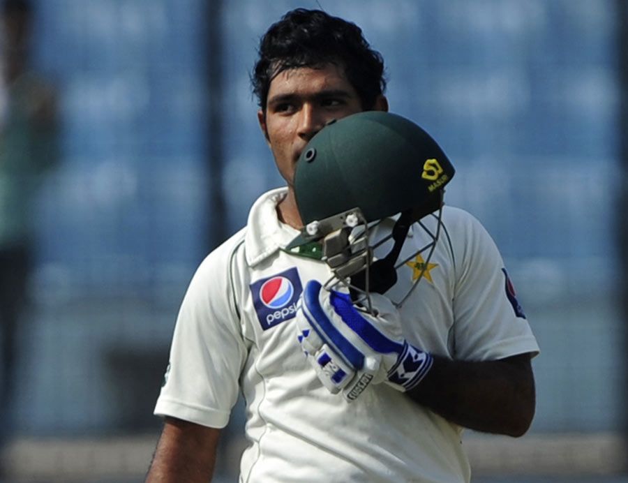 Asad Shafiq kisses his helmet on reaching his century | ESPNcricinfo.com