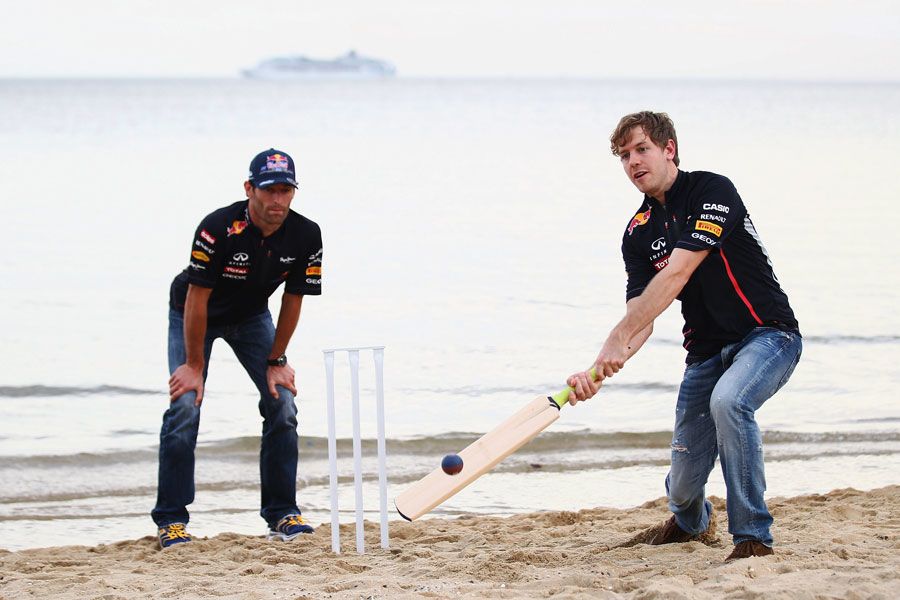 Formula 1 drivers Mark Webber and Sebastian Vettel try their hand at ...