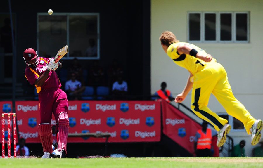 Kieron Pollard hits out against the bowling of Shane Watson ...