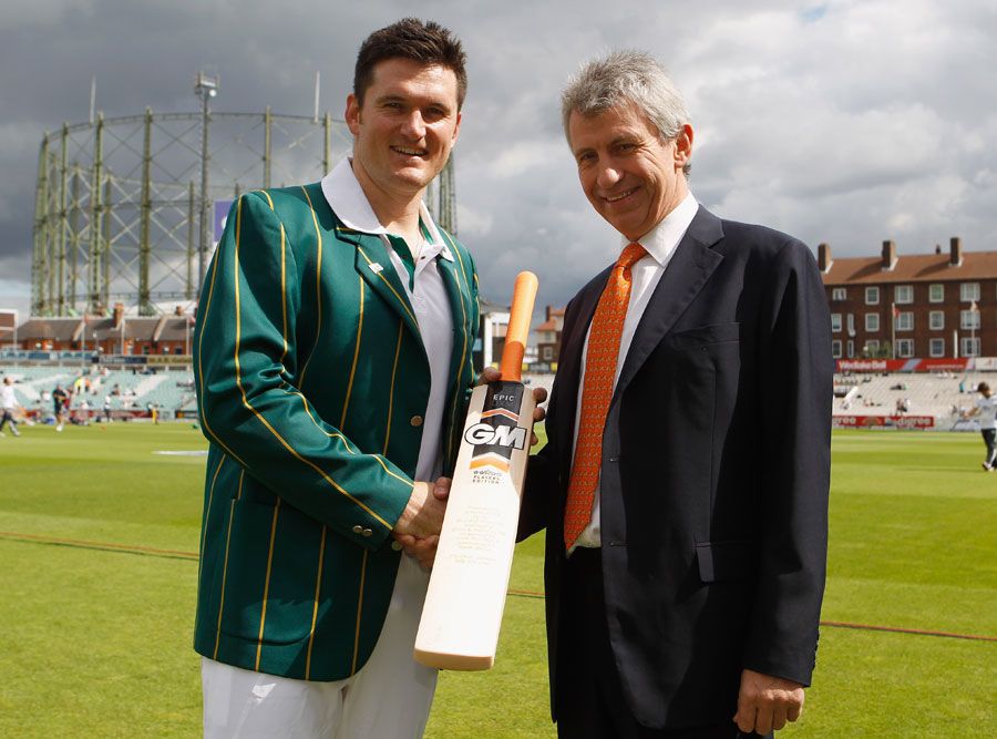 Graeme Smith is presented with a bat to mark his 100th Test ...