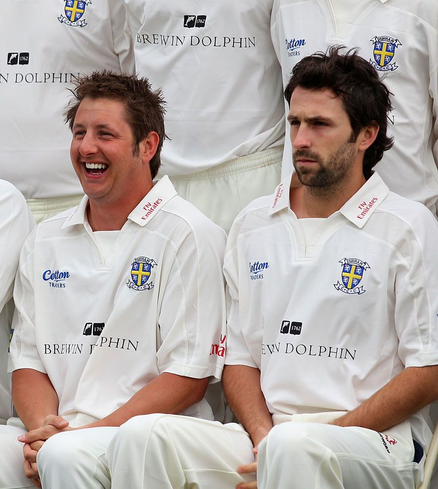 Phil Mustard and Graham Onions sit side by side for a Durham squad ...