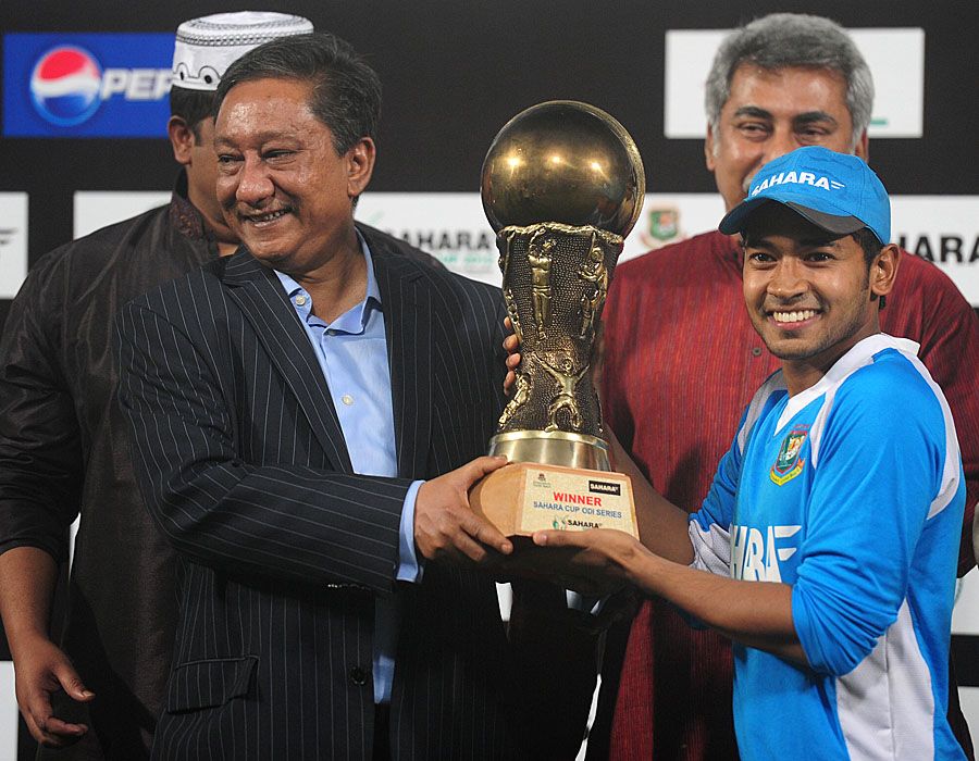 Mushfiqur Rahim holds the trophy after winning the series ...