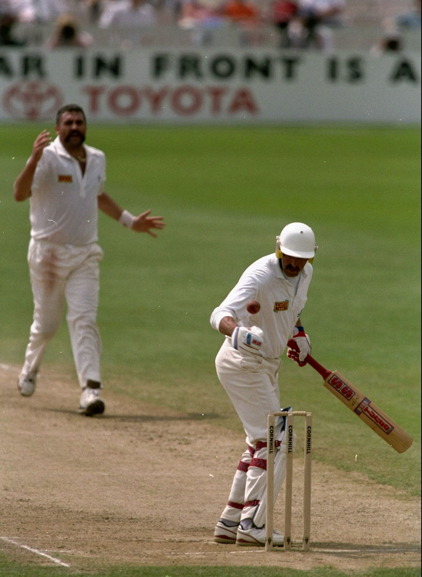 Graham Gooch handles the ball | ESPNcricinfo.com