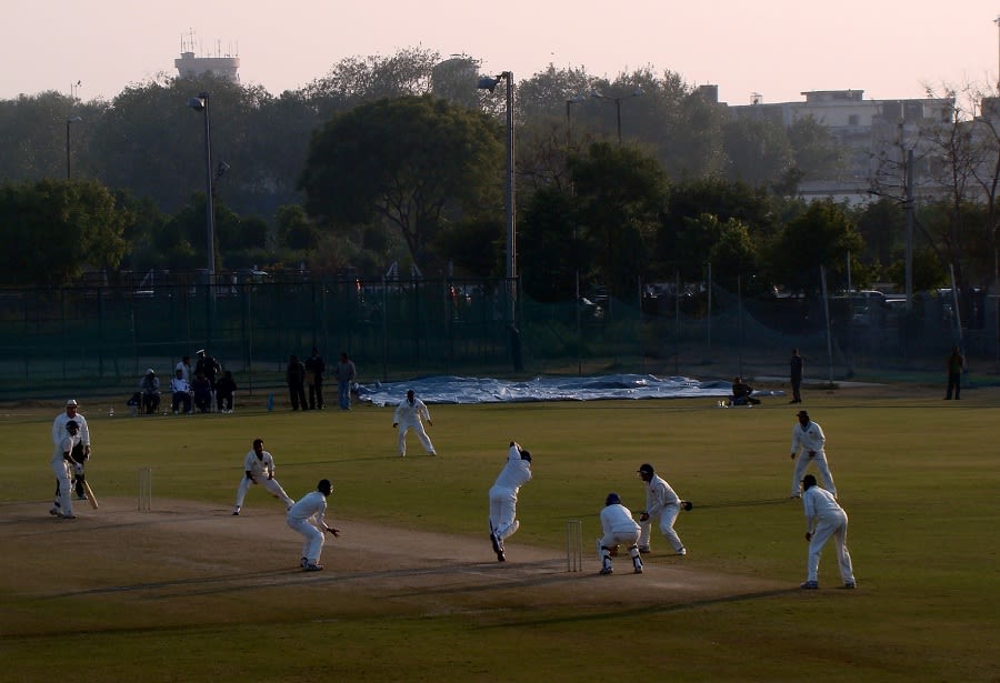 Mumbai and Services play in sombre conditions at the Palam Ground ...