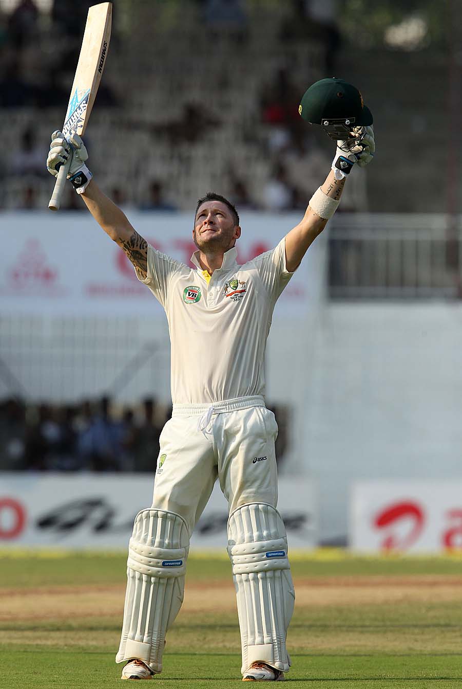 Michael Clarke celebrates his century off the final over of the day ...