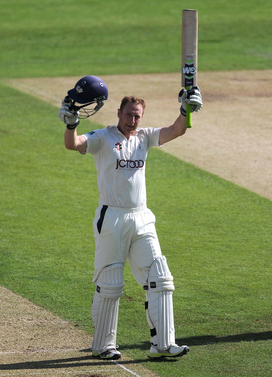 Andrew Gale raises his bat after reaching his century | ESPNcricinfo.com