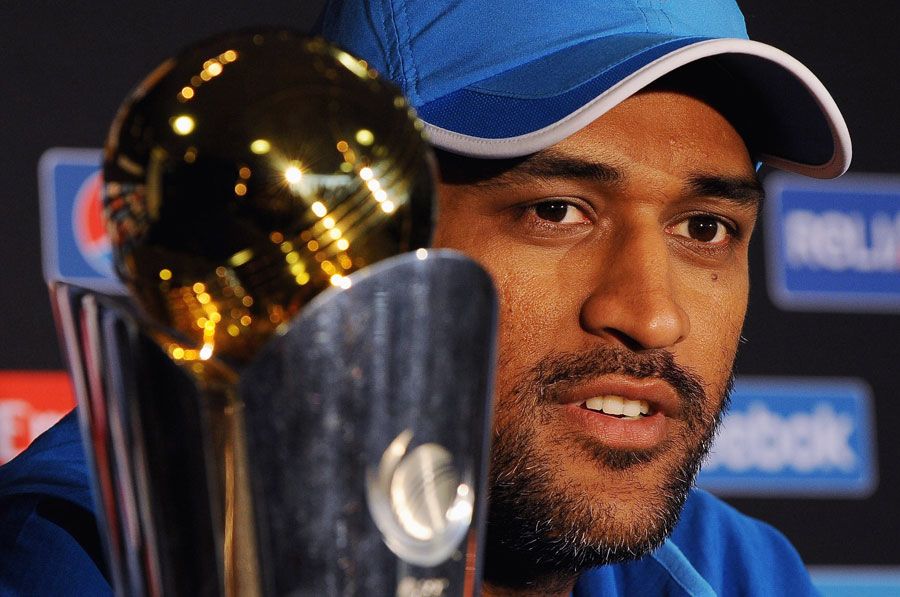 MS Dhoni with the Champions Trophy | ESPNcricinfo.com