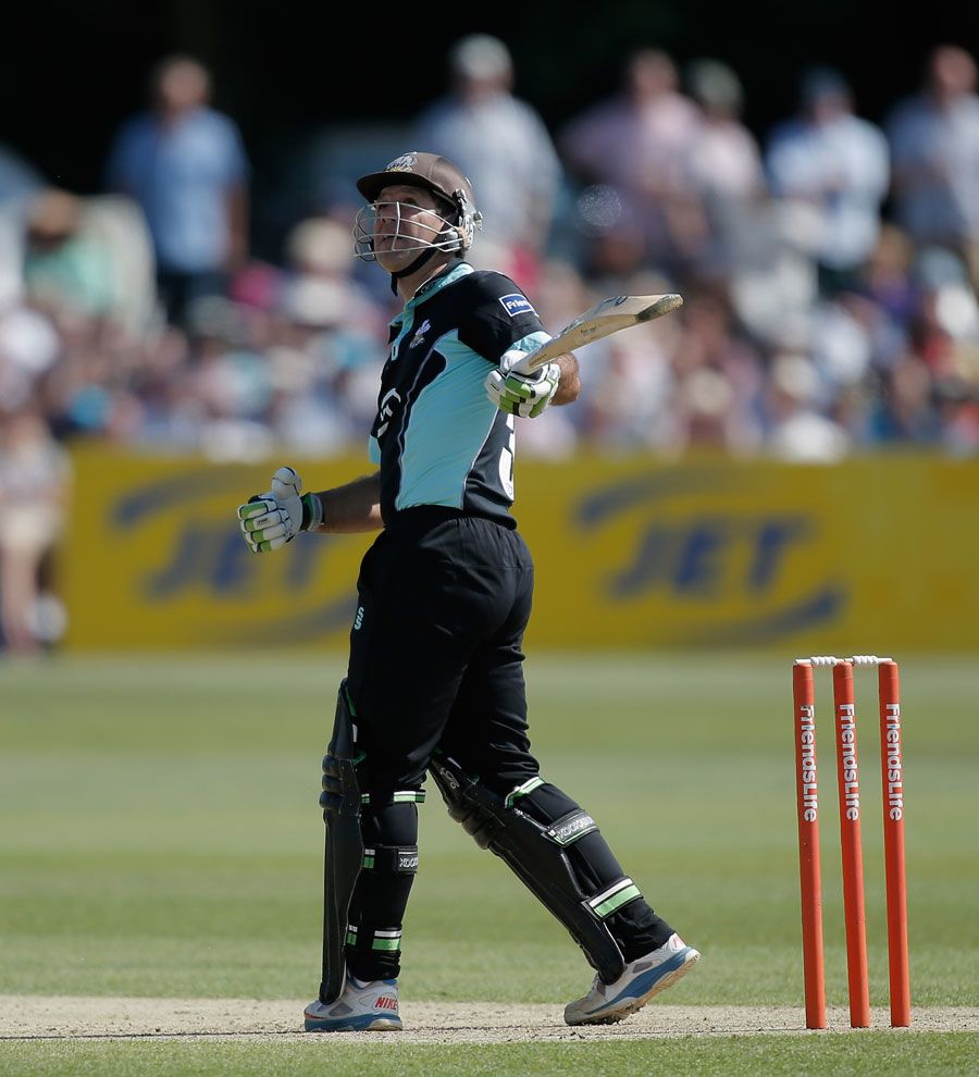 Ricky Ponting takes his hand off the bat in hitting a six ...