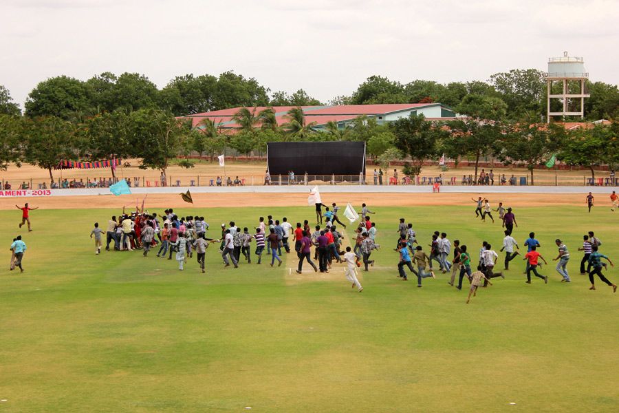 The crowd invades the field at the end of the Rural District Tournament ...