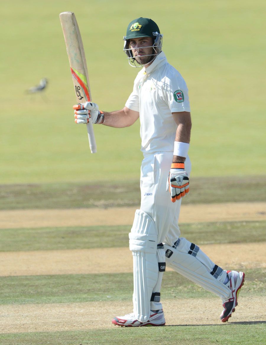 Glenn Maxwell raises his bat after reaching a century | ESPNcricinfo.com