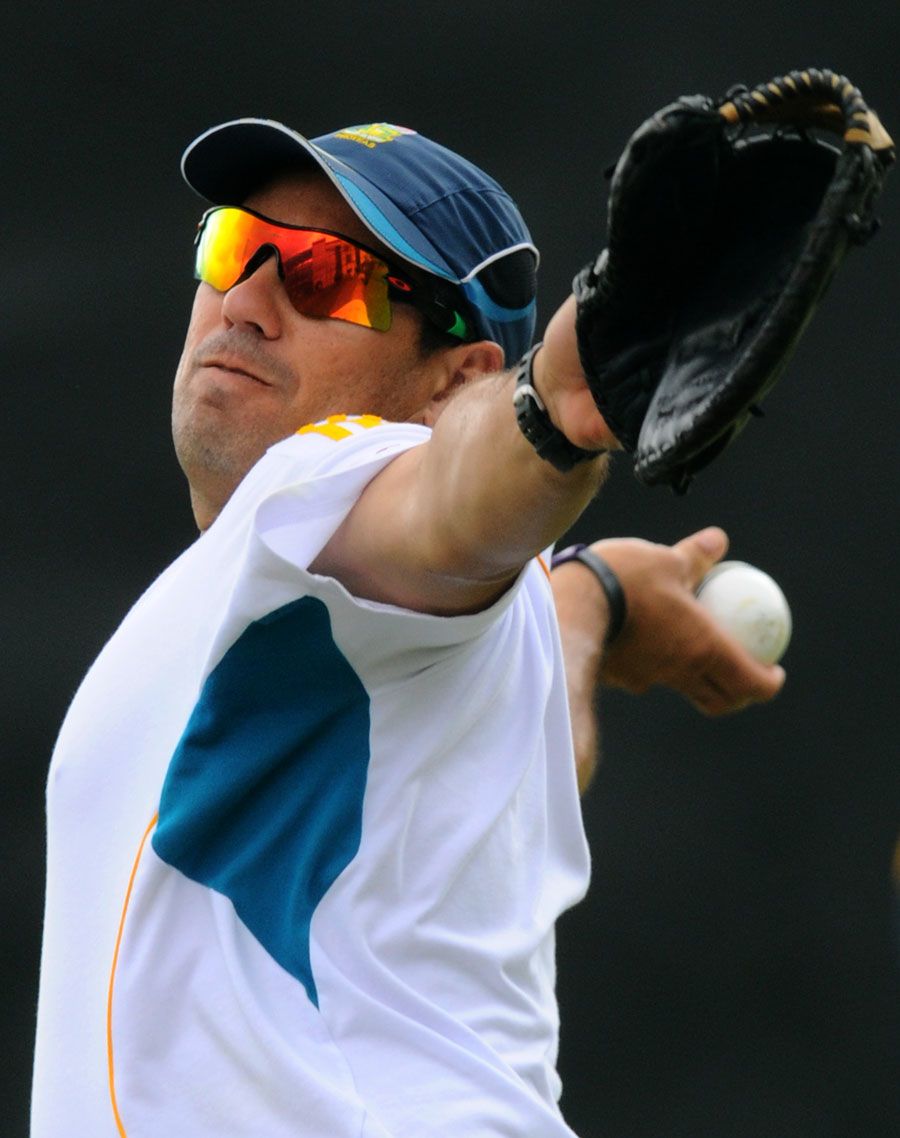 South Africa coach Russell Domingo throws a ball during training ...