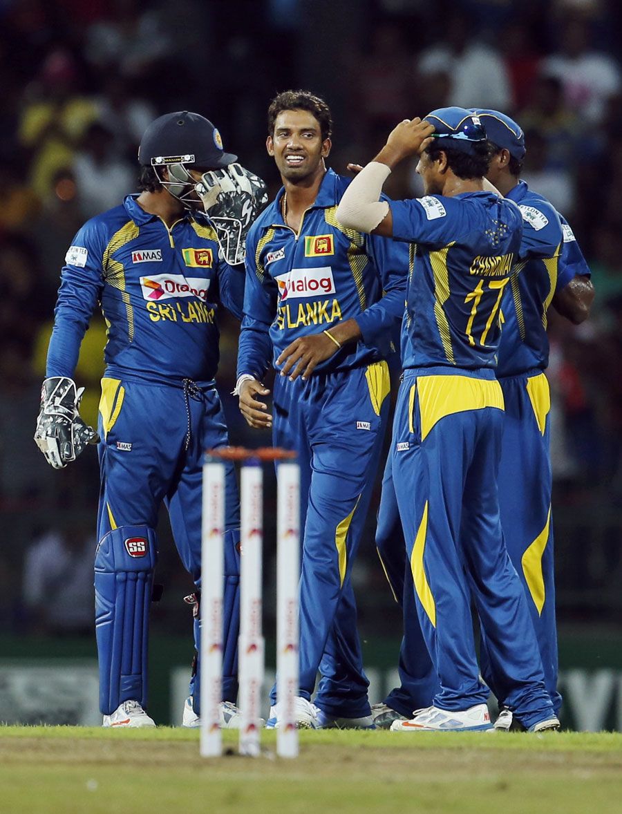 Sachithra Senanayake is congratulated after dismissing Faf du Plessis ...