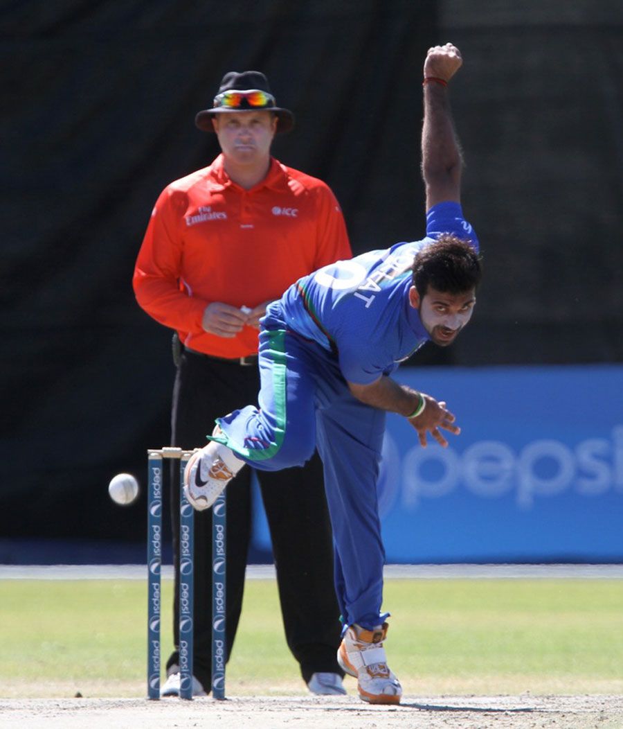 Afghanistan fast bowler Dawlat Zadran in his delivery stride ...