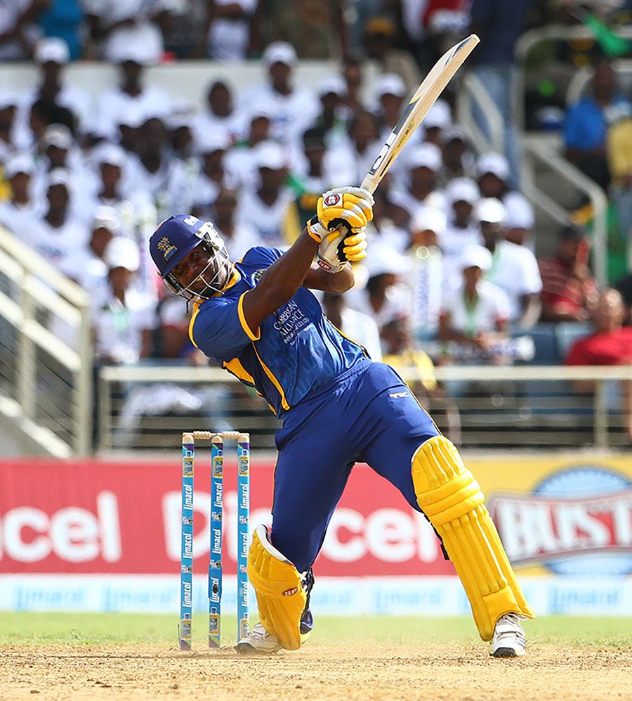 Dwayne Smith heaves the ball over the top | ESPNcricinfo.com