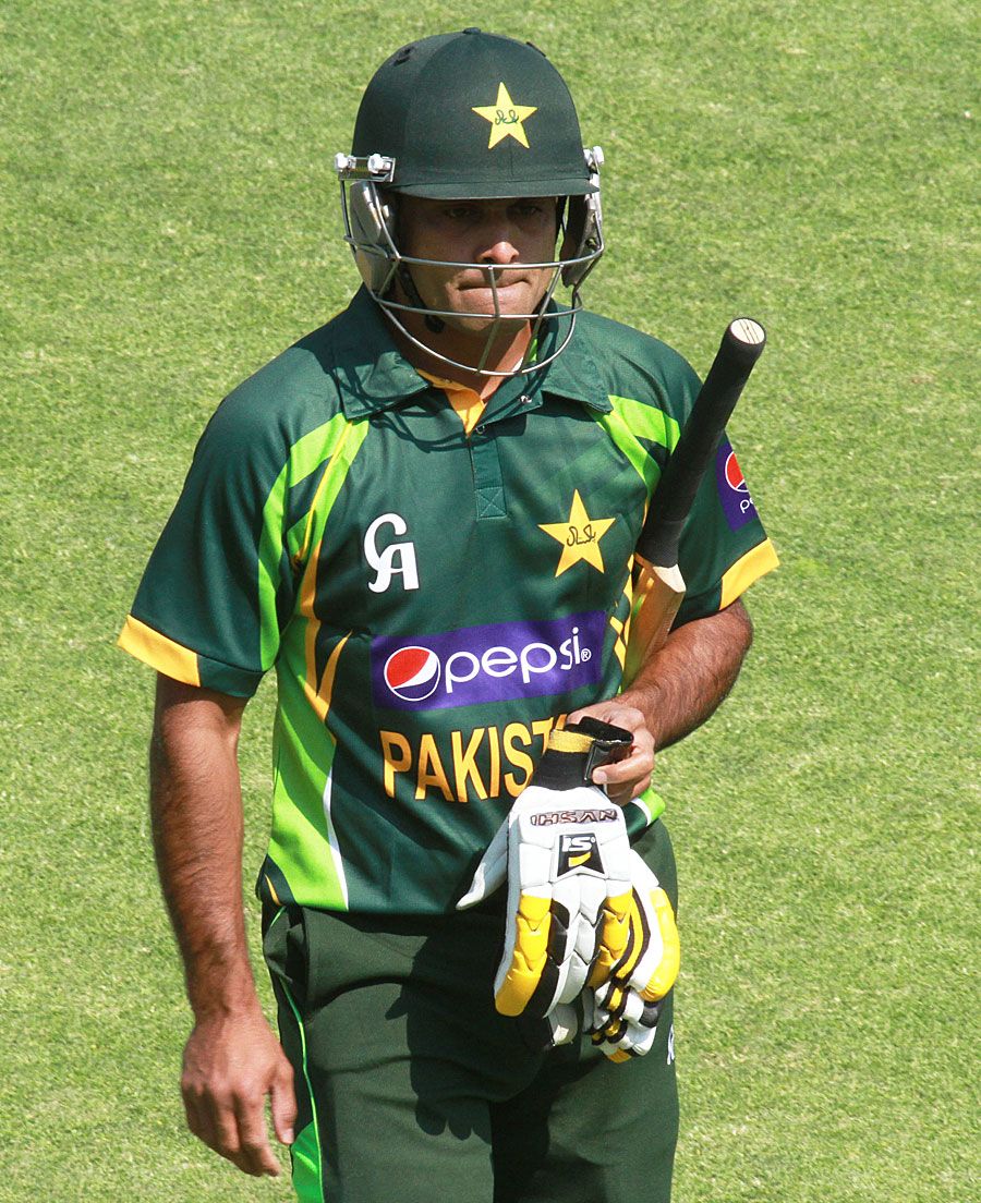 Mohammad Hafeez walks back after scoring 3 | ESPNcricinfo.com