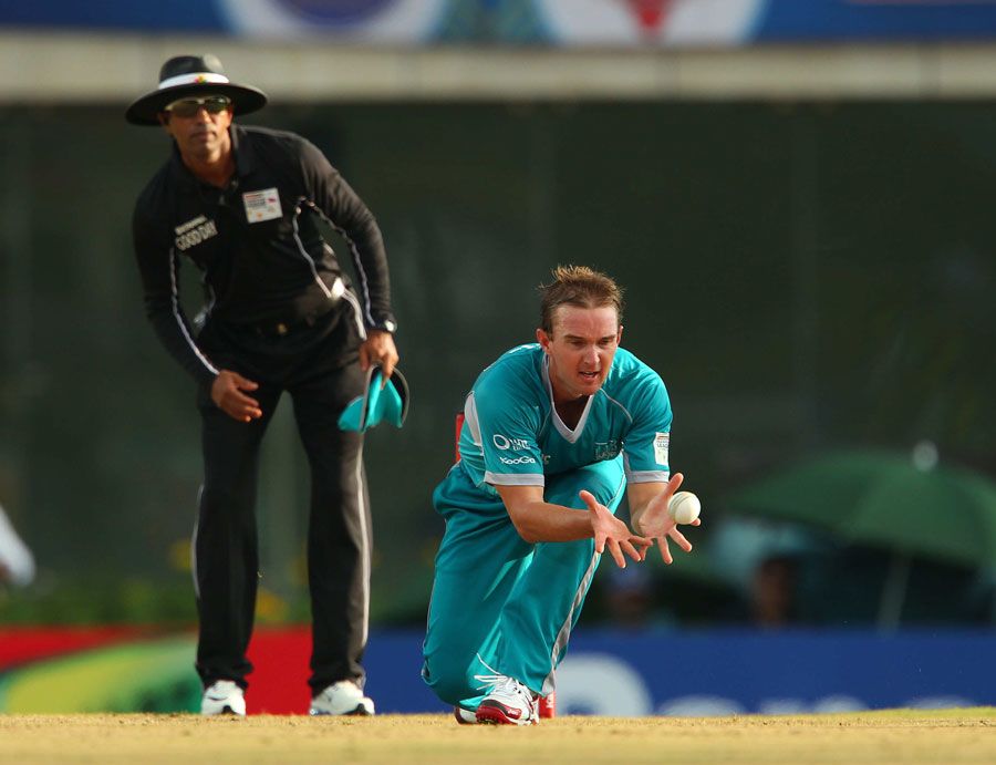 Nathan Hauritz takes a sharp return catch to dismiss Sherwin Ganga ...