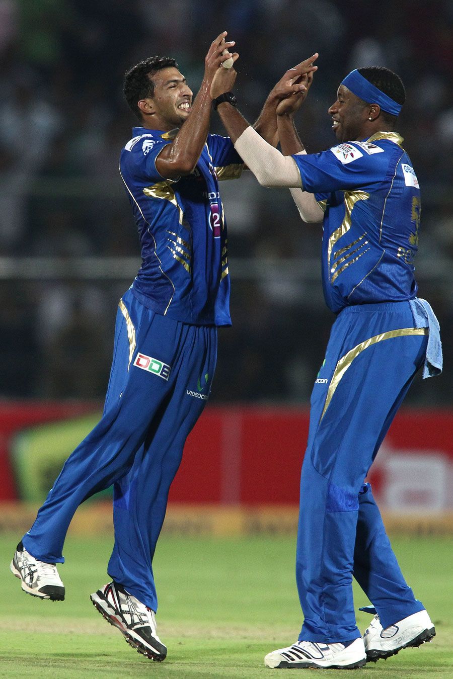 Rishi Dhawan celebrates a wicket with Kieron Pollard | ESPNcricinfo.com