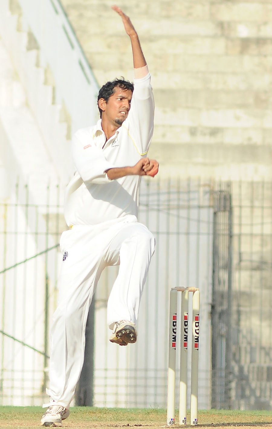 Malolan Rangarajan in his bowling stride | ESPNcricinfo.com
