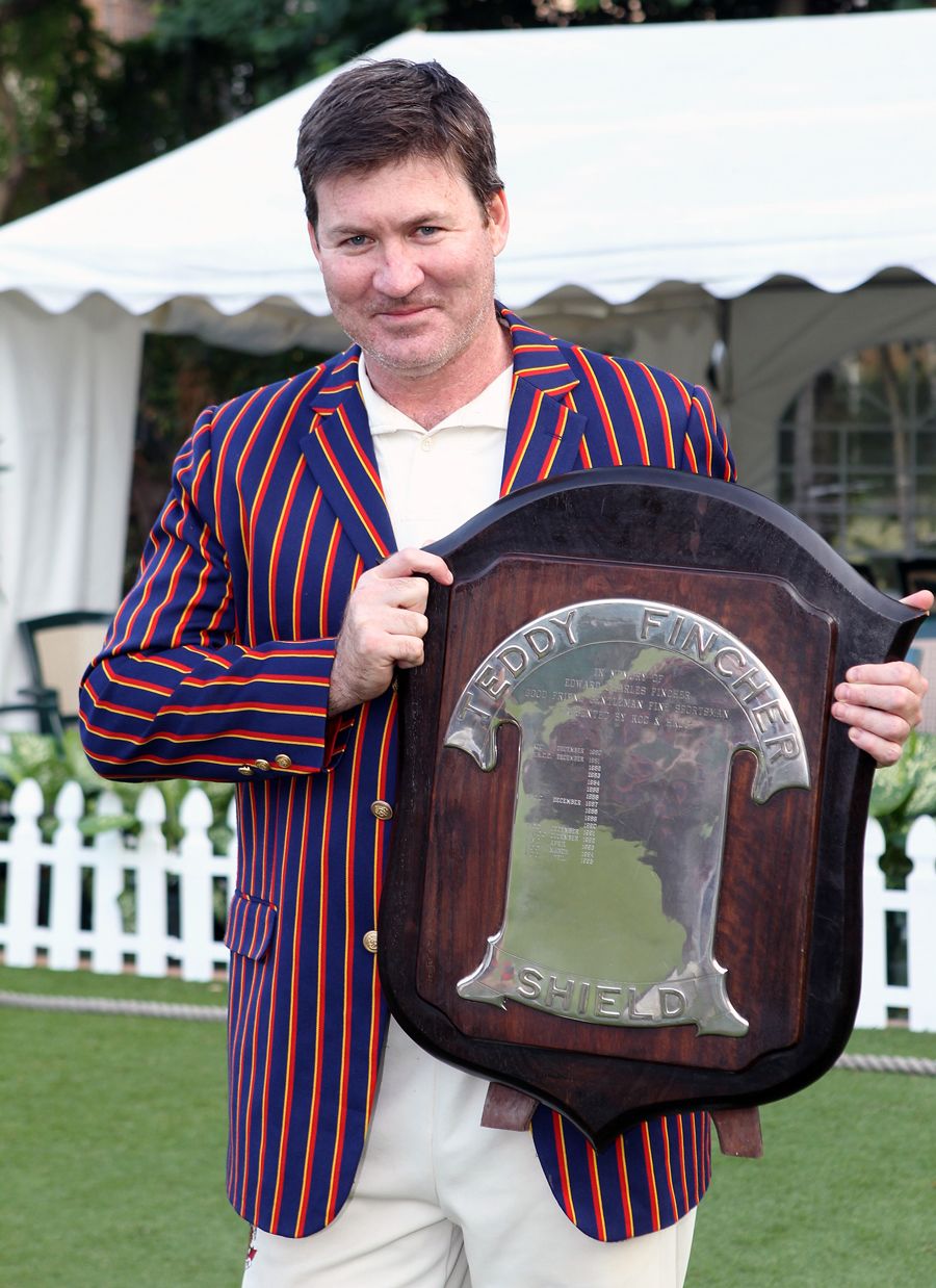 Victorious HKCC skipper Tim McMahon poses with the Fincher Shield ...