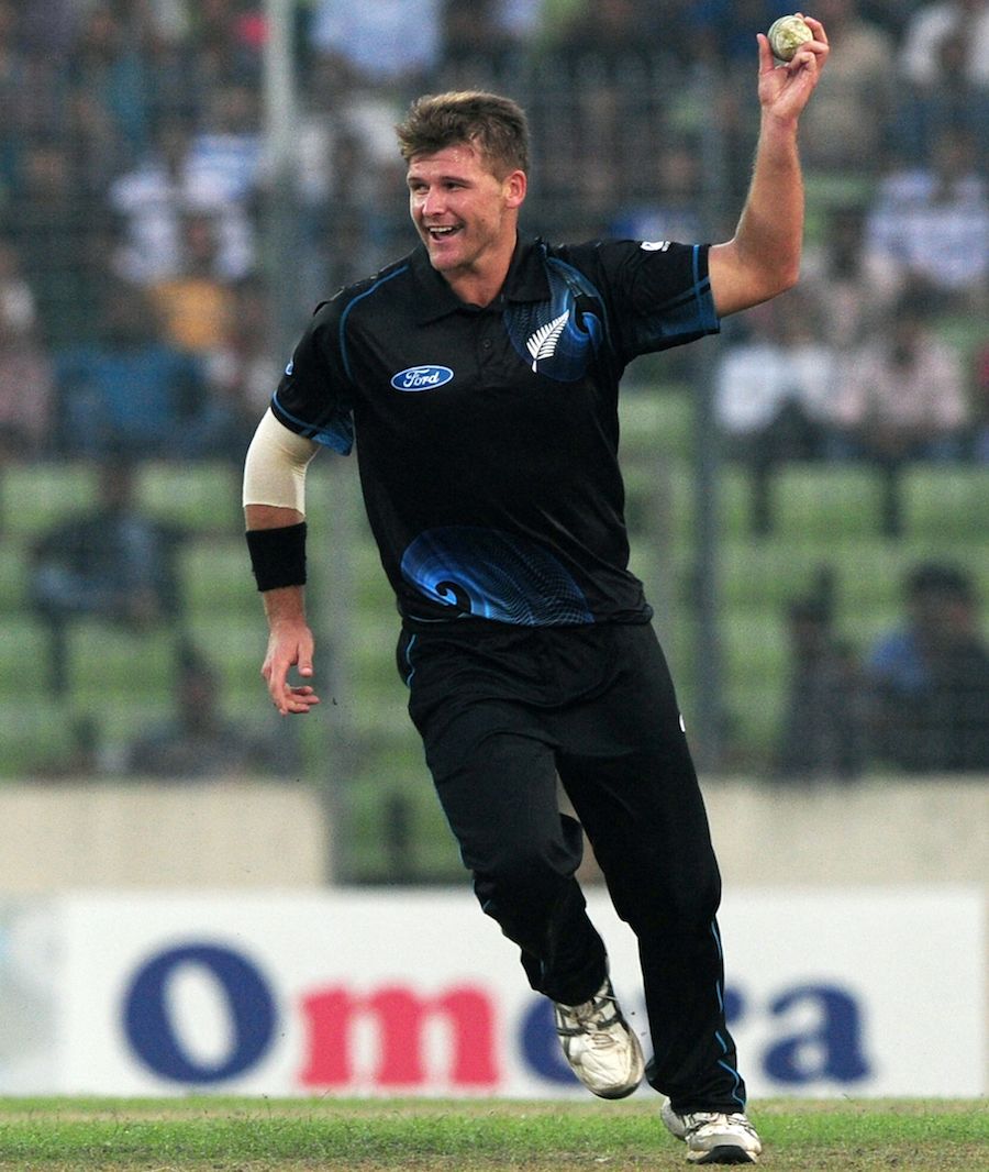 Corey Anderson reacts after taking a catch off his own bowling ...