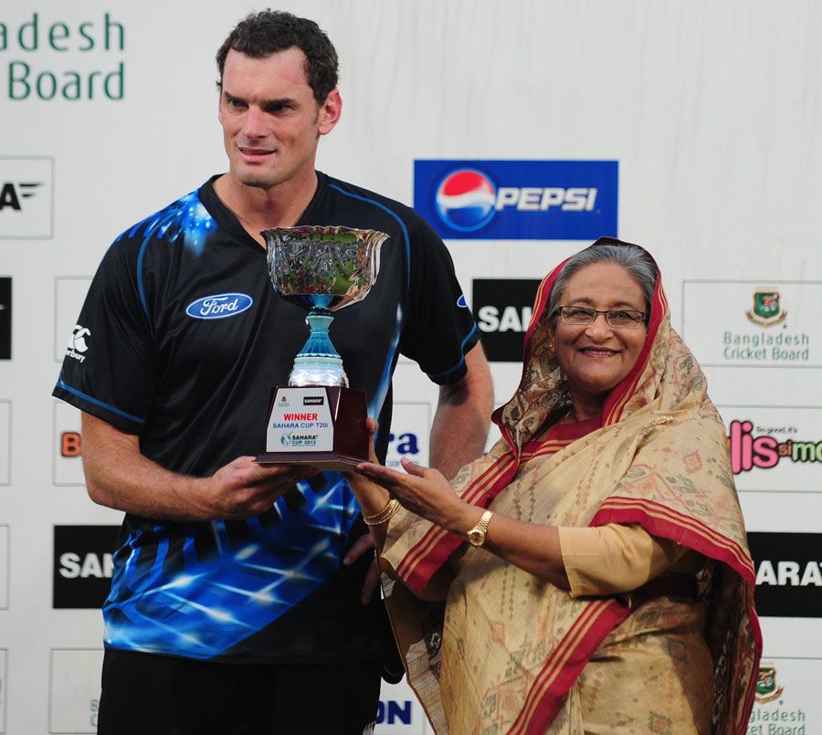 Kyle Mills receives the T20I trophy from Bangladesh Prime Minister ...