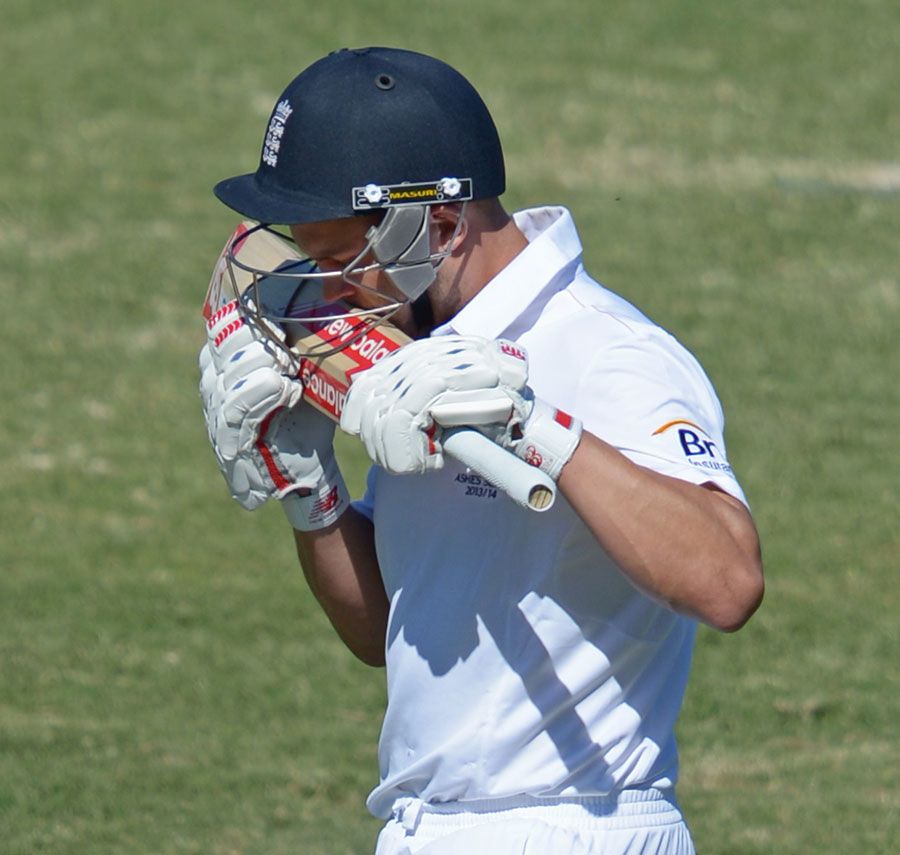 Jonathan Trott gets up and close and personal with his bat after being ...